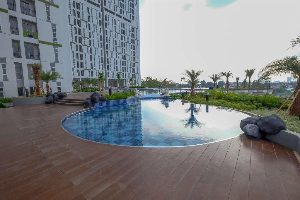 Warm and Comfort Stay 1BR Akasa Pure Living BSD Apartment By Travelio ...