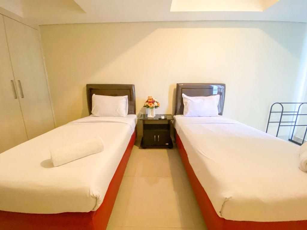 Minimalist Studio Room Marquis de Lafayette Apartment By Travelio ...