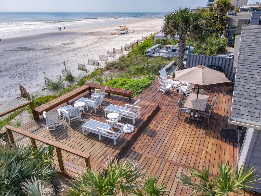 Beachfront Deck with steps down to the white sandy beach Sea Dunes ...