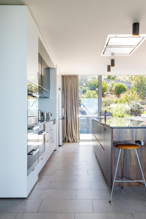 Architectural glass house with ocean views, Taroona (updated prices 2025)