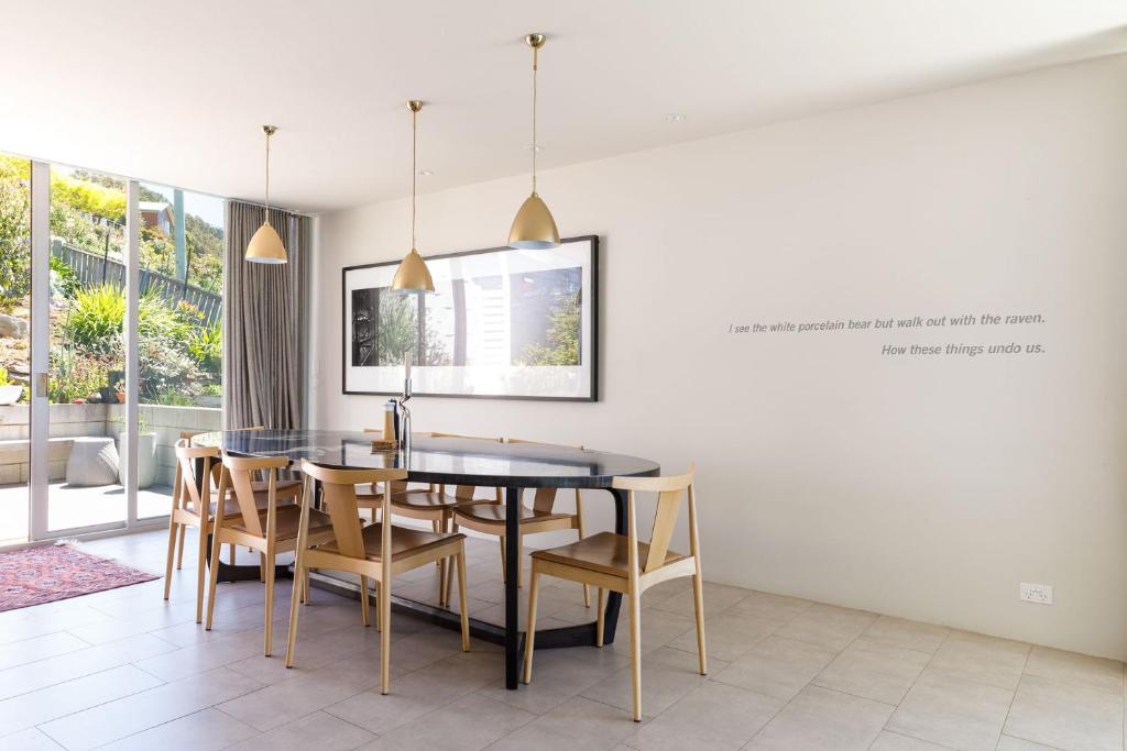 Architectural glass house with ocean views, Taroona (updated prices 2025)