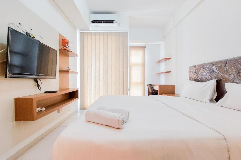 Restful Studio Room at Akasa Pure Living BSD Apartment By Travelio ...