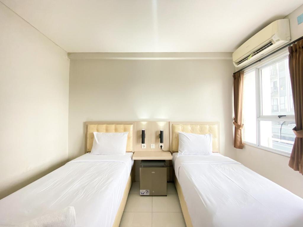 Comfort and Homey Studio Room (No Kitchen) Elvis Tower Apartment By ...