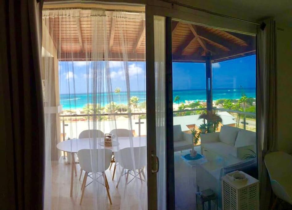 Amazing studio apt , Oasis Condominium ,EagleBeach,Sea view,, Palm ...