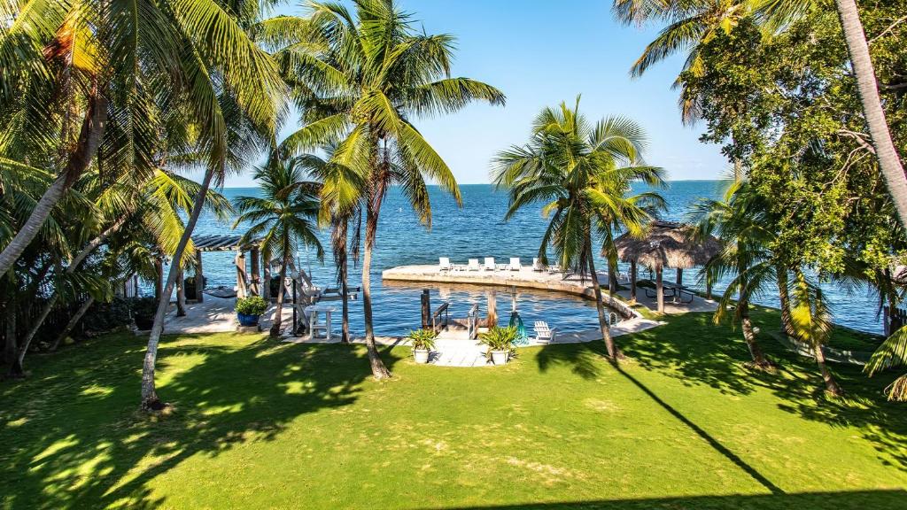 Lush tropical plantings in a gated compound located directly on the ...