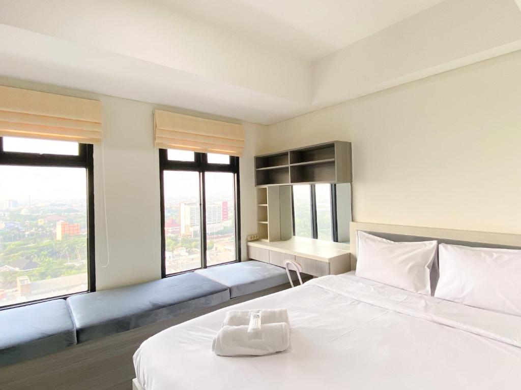 Cozy and Comfort 2BR at Pollux Chadstone Apartment By Travelio ...