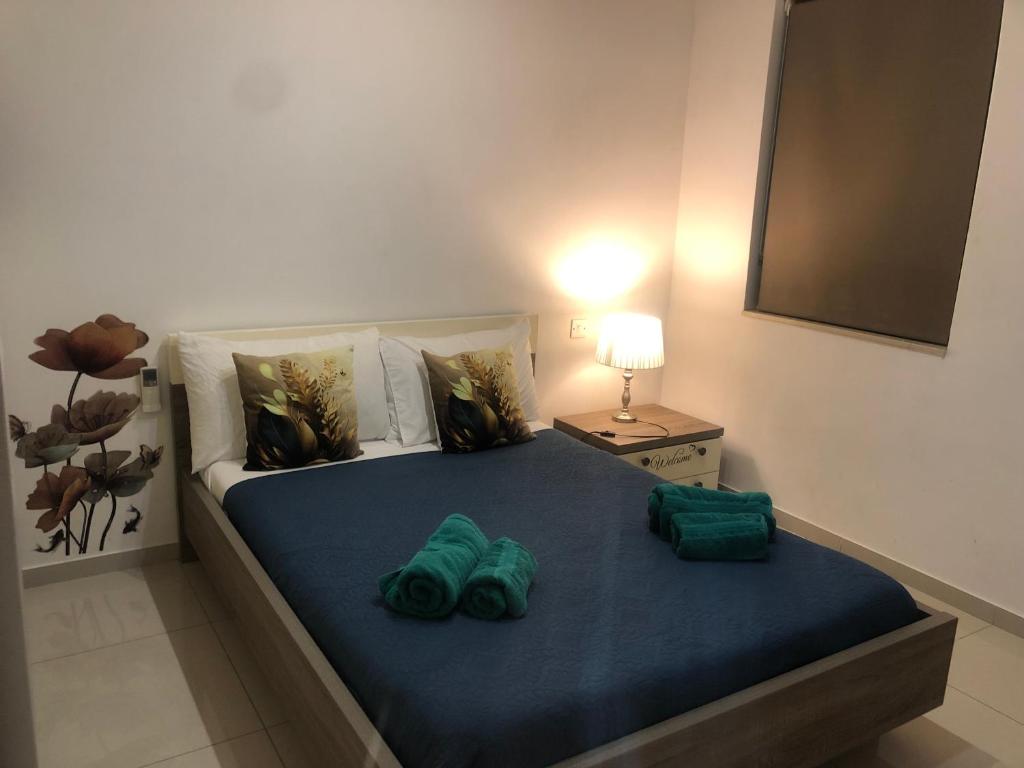 Stanza in appartamento condiviso vicino Paceville e San Giuliano, Is ...