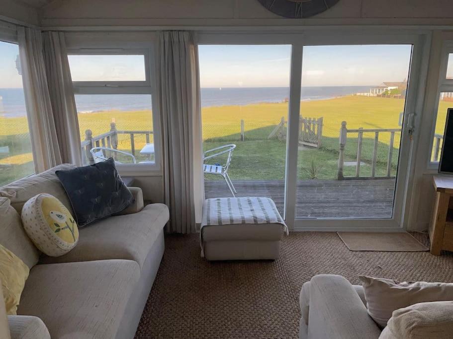 Stunning sea view beach front bungalow Bacton, Bacton (updated prices 2025)