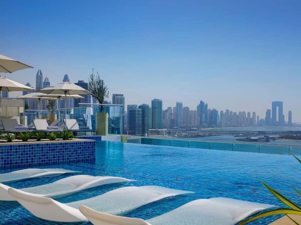 SEVEN PALM LUXURY Apartment PRIVATE BEACH, INFINITY Rooftop Pool with ...