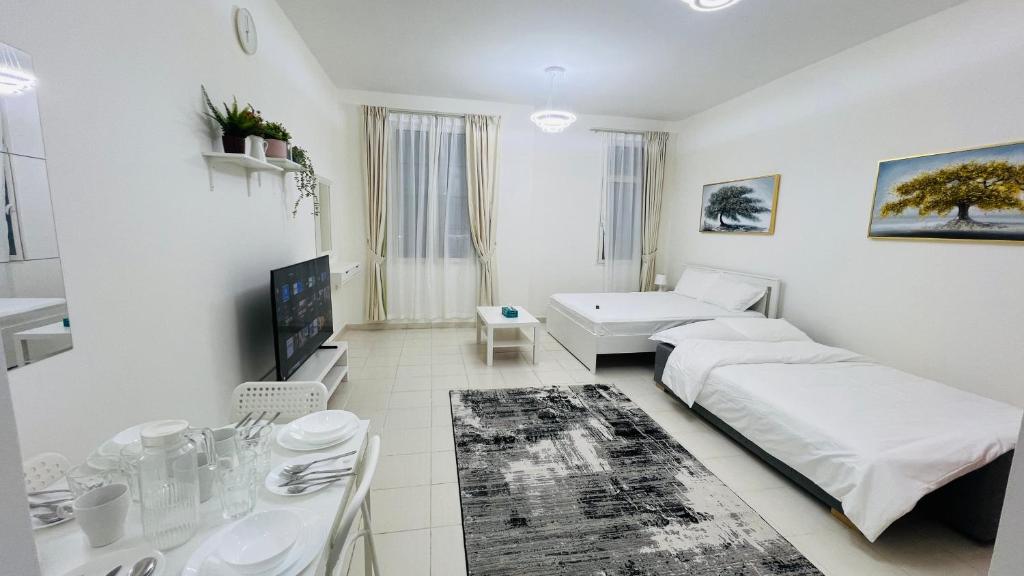 France cluster International city - Spacious Bright Furnished Studio apartment, Dubai (updated ...