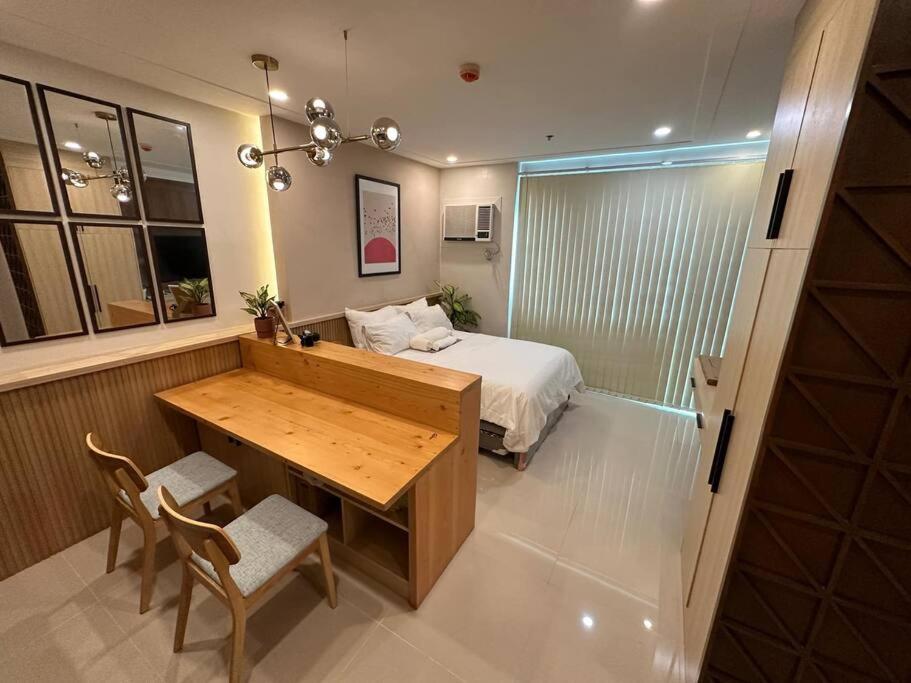 A cozy home feel with a city view - The Capitol at Sitari, Bacolod ...