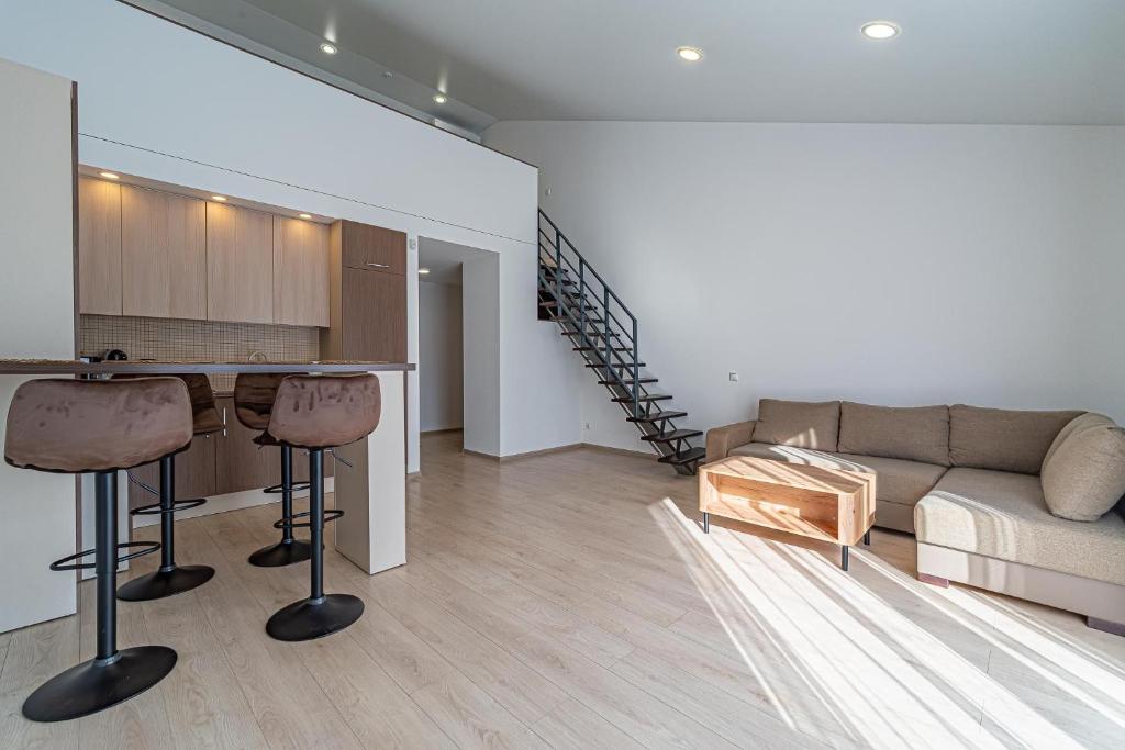 Urban loft with AC and parking, Kaunas (updated prices 2025)