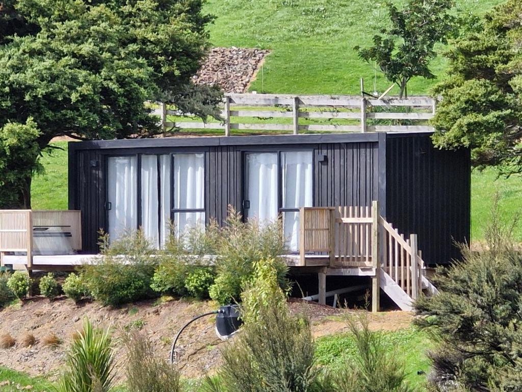 Twin Totara Cottage, Mangawhai (updated prices 2026)