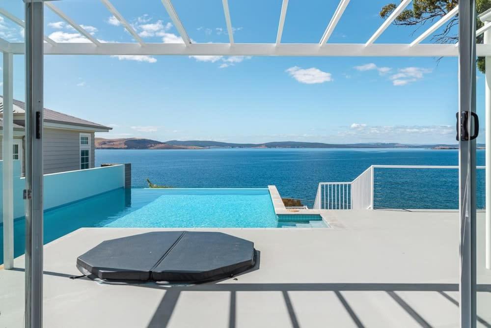 Luxury waterfront home with infinity pool, Taroona (updated prices 2025)