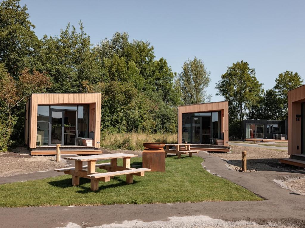 Cleverly decorated tiny house, on a holiday park 1 km from the beach ...
