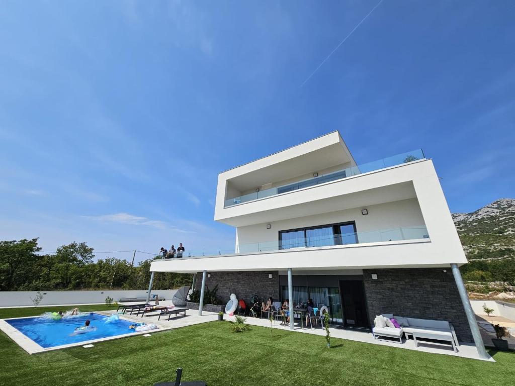 Apartments with a swimming pool Seline, Paklenica - 23594, Starigrad ...