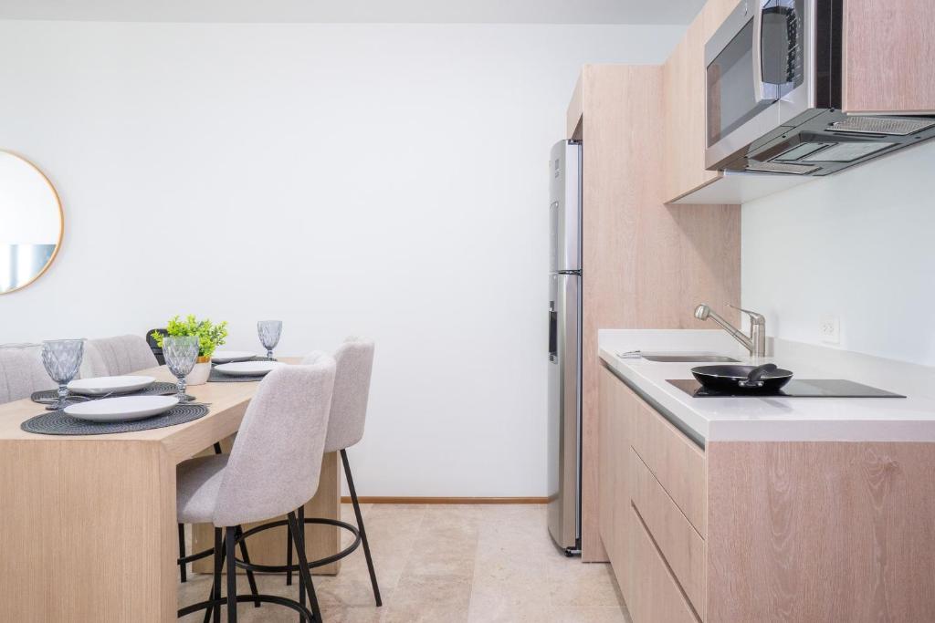 Menesse Town Tower 203 condo, Playa del Carmen (updated prices 2026)