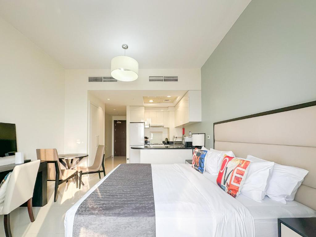 Bespoke Holiday Homes - High floor studio in Tower 108 JVC, Dubai ...