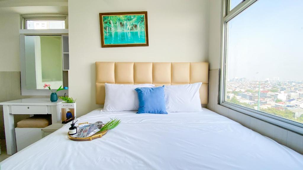 Spacious and Homey 3BR at Green Bay Pluit Apartment By Travelio ...