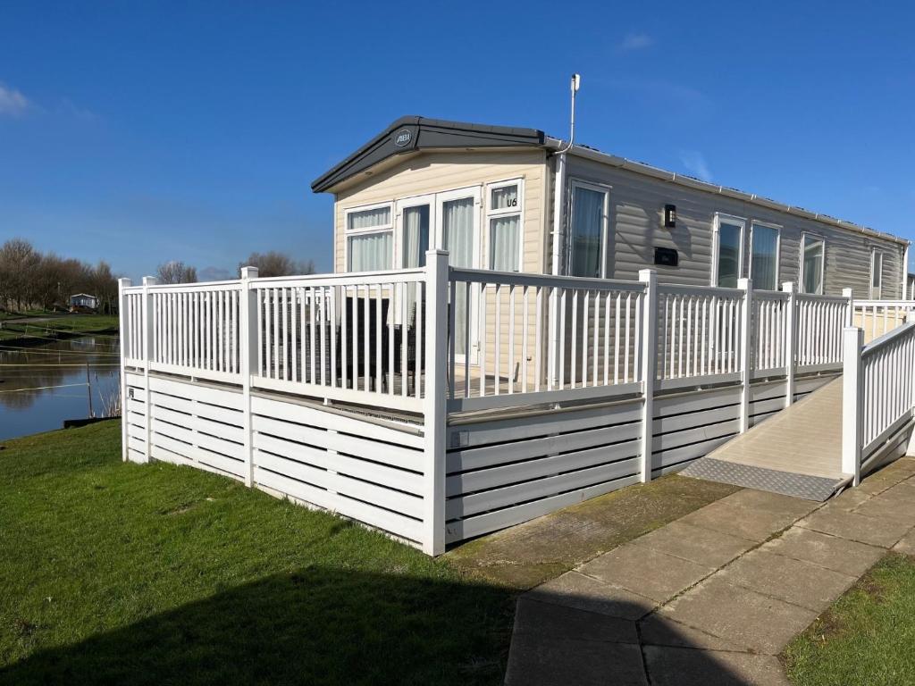 2 bed, 2 bath with decking overlooking the fishing lake at Sand Le Mere ...