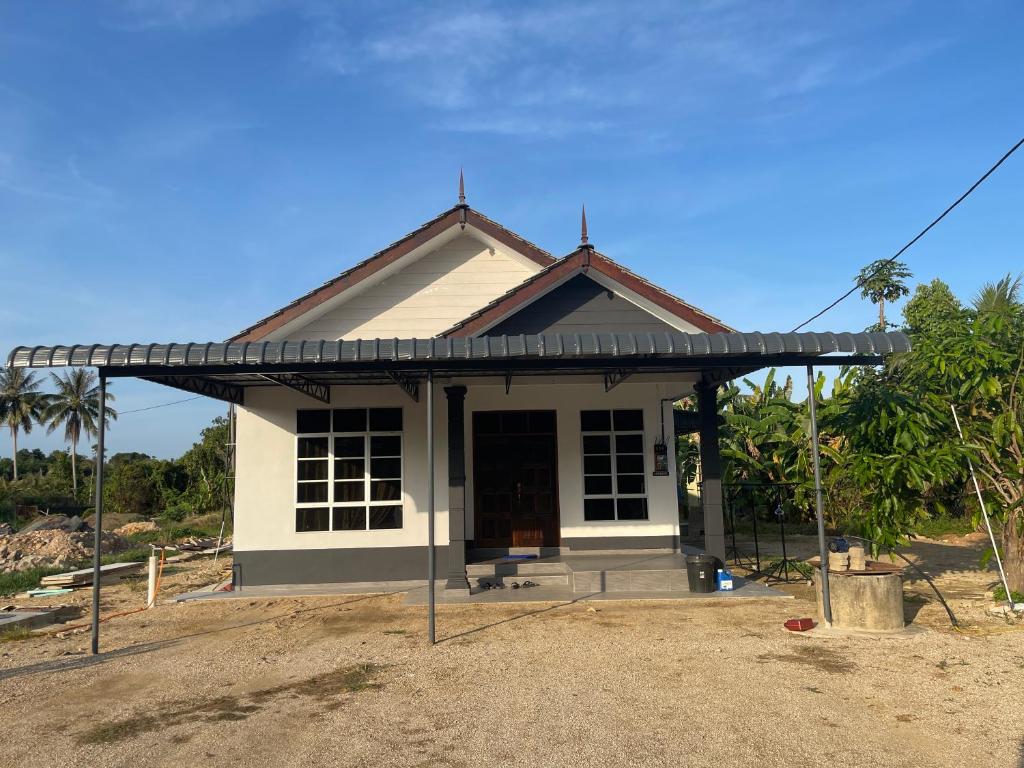Homestay Cikgu Ros, Kampong Bukit Puteri (tarifs actualisés, 2025)