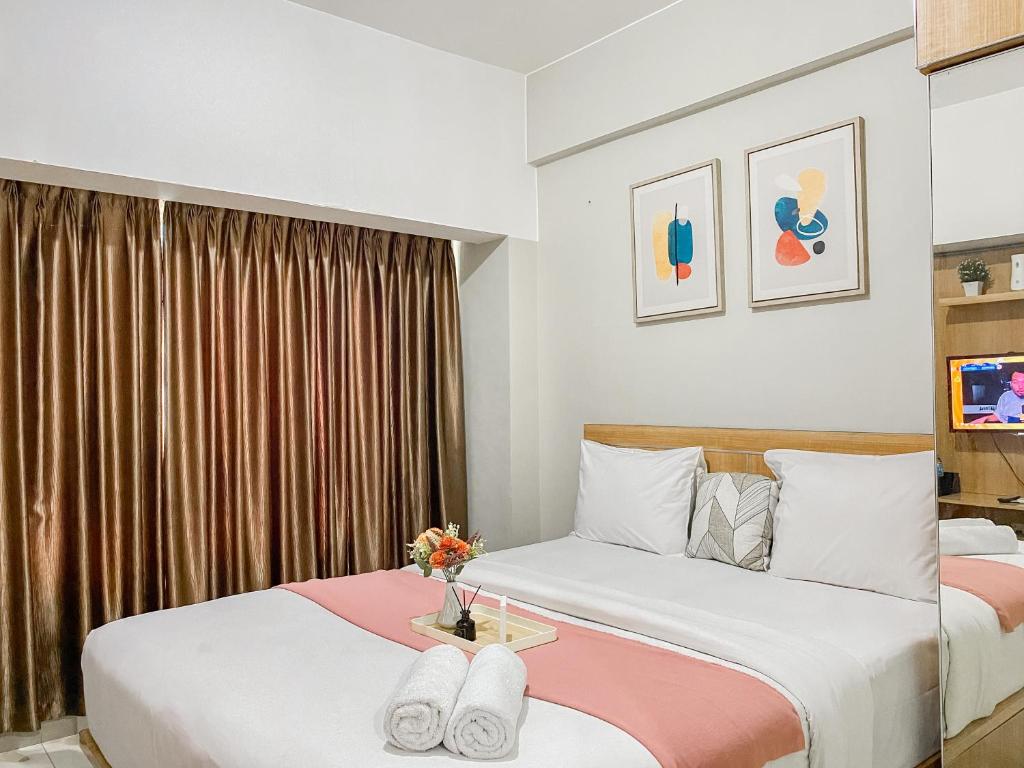 Well Designed Studio Springlake Summarecon Bekasi Apartment By Travelio ...
