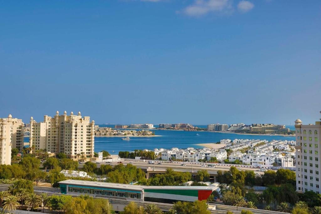 Tumbi West Palm Beach Hotel Dubai,Tapestry Collection Hilton, Dubai ...