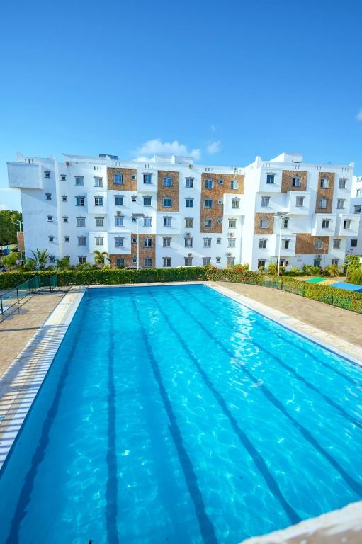 3 BR Group Stay Mombasa - AC-Pool-Gym-Playground- Haven & Harmony Hosts ...