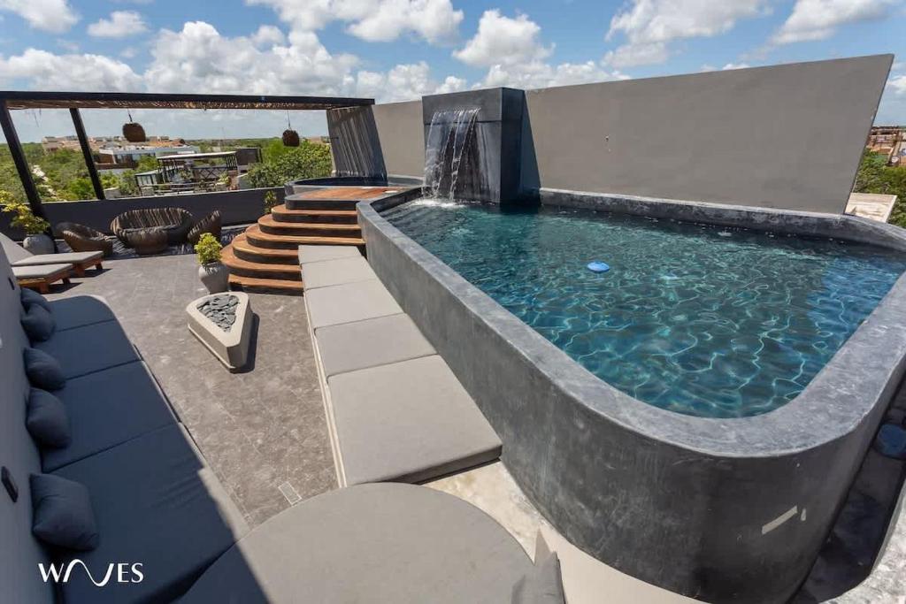 Luminous 2 BR with Roof Pool Close to Hotel Zone by Waves Management ...