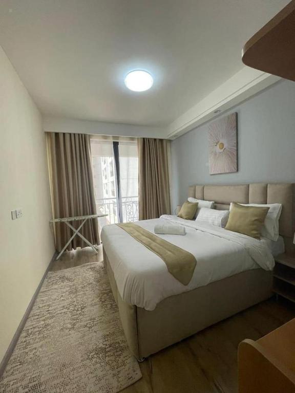 royal essence apartment with heated swimming pool,ample parking space ...