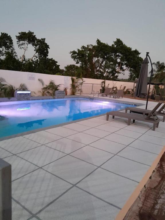 Oricha Villa- Stylish 2-Bedroom Retreat with AC & Pool Access, Ocho ...