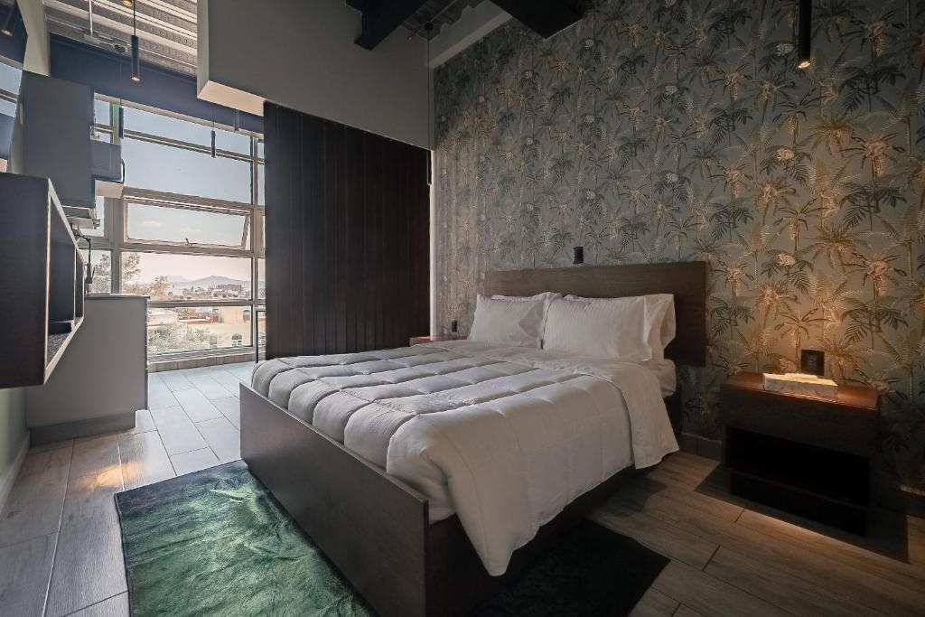 The Jungle Loft Tropical Comfort in a Centric Location with Kitchen ...