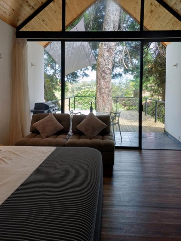 Tree House, Cabaña privada con Jacuzzi, Guatapé (updated prices 2025)