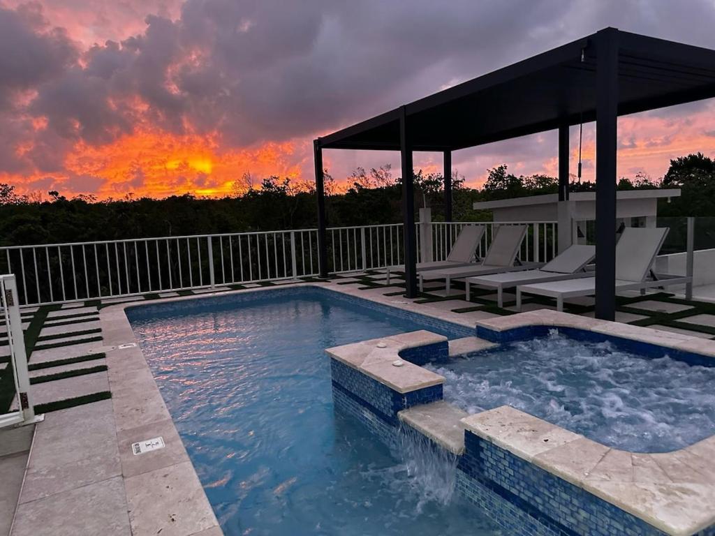Skyline Retreat- Luxury Studio with Rooftop Pool, TV & AC, Falmouth ...