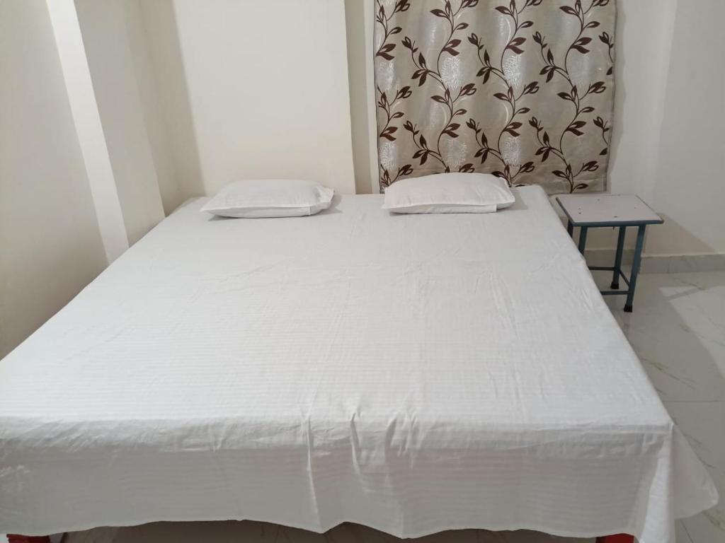 Om guest house, Jasidih (tarifs actualisés, 2025)