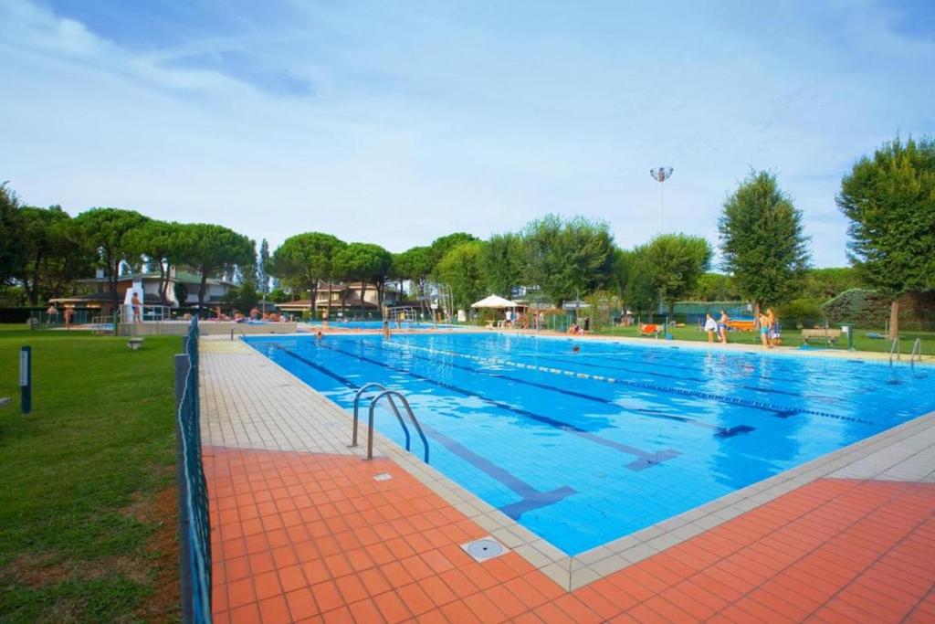 Two storey terraced house in a residence with a pool, Bibione (updated ...