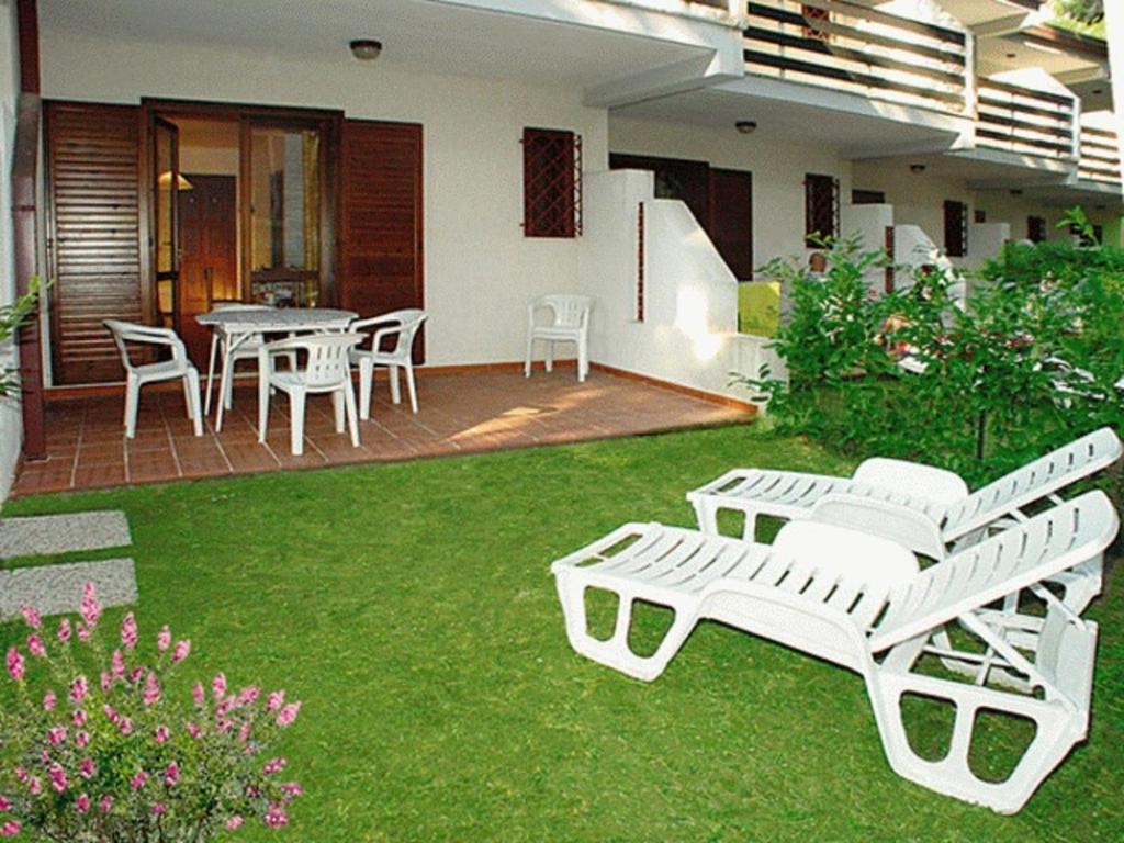 Nice row house with garden for 8 guests in Lignano Pineta, Lignano ...