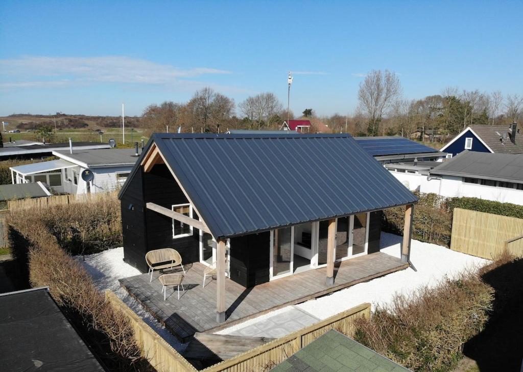 Fijn strandhuis dicht aan zee!, Ouddorp (tarifs actualisés, 2025)