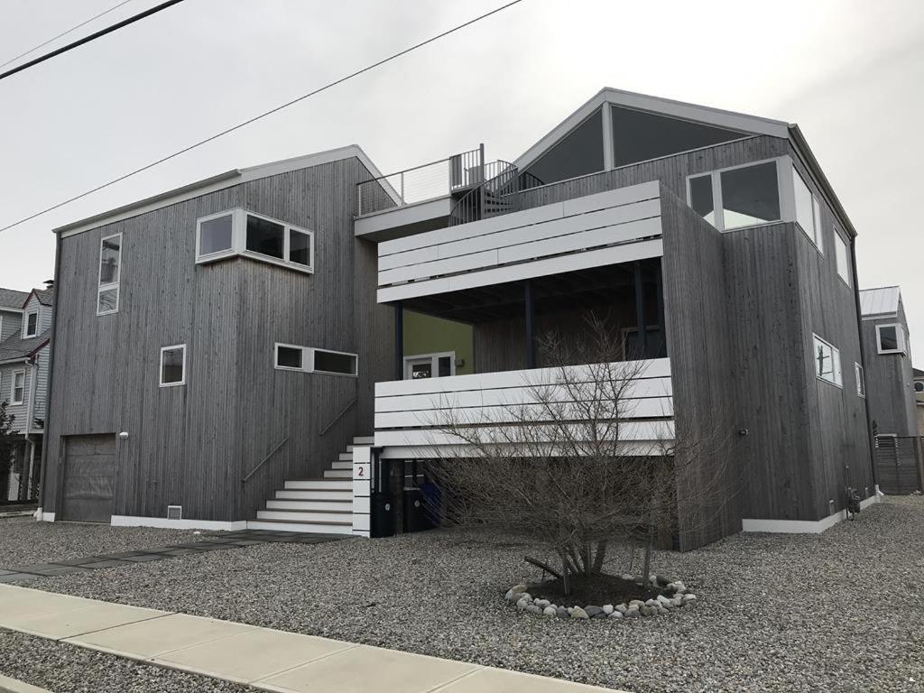 Heated Pool, Beach Badges, Roof Top Deck With Views, Private Yard ...