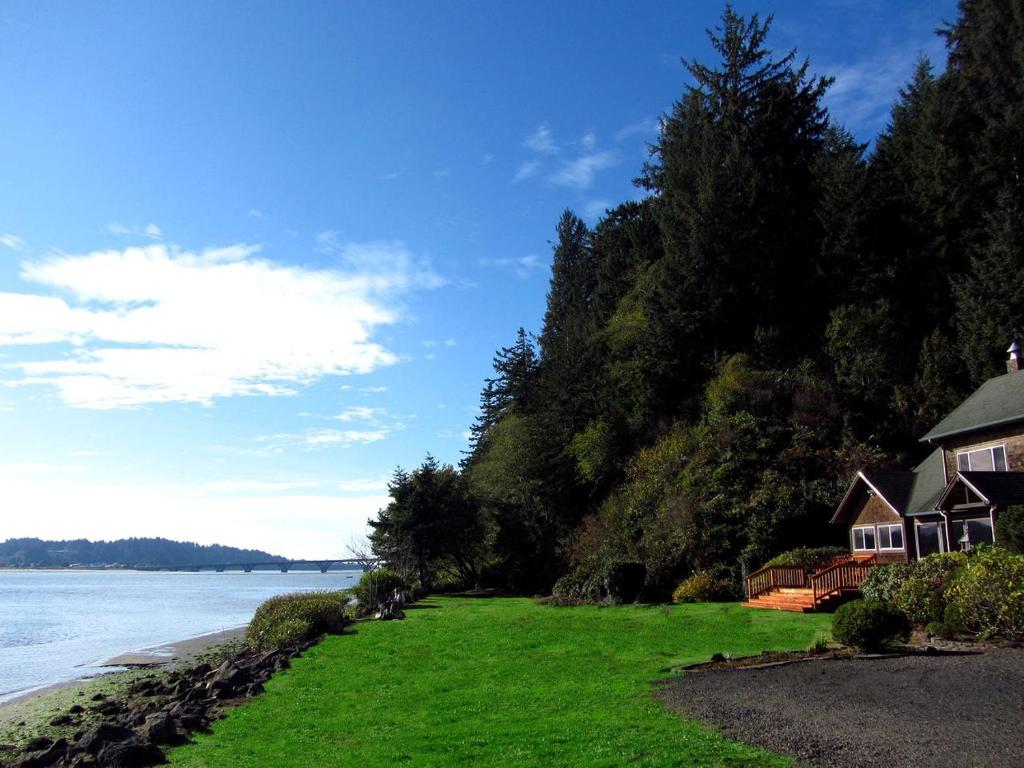 Riverfront Villa with Covered Hot-tub and Amazing Interior in Waldport ...