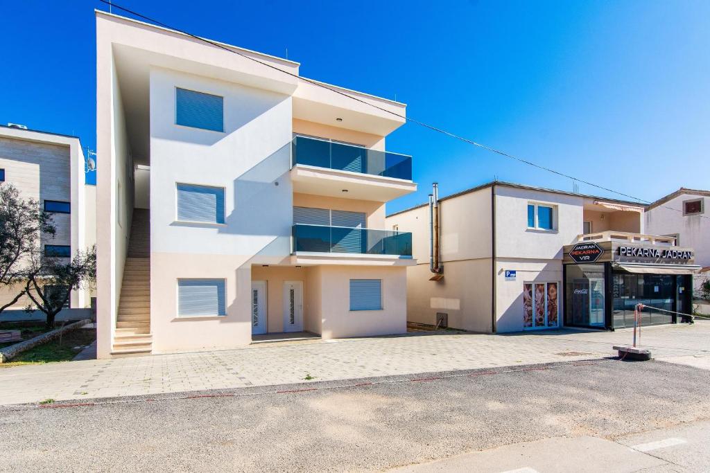 Apartments with parking space Vir - 24331, Vir (updated prices 2026)