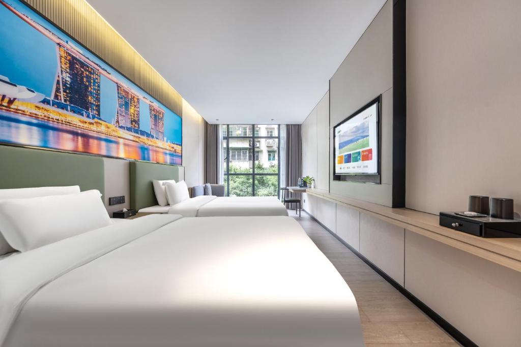 Nuo man Hotel 诺漫酒店 - - - Free shuttle bus service will be provided at ...