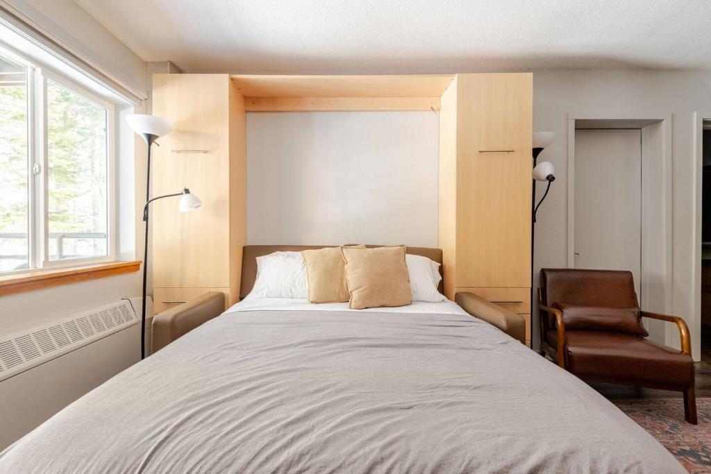 Super-Efficient Studio with Full Kitchen Balcony & Smart Sleeping ...