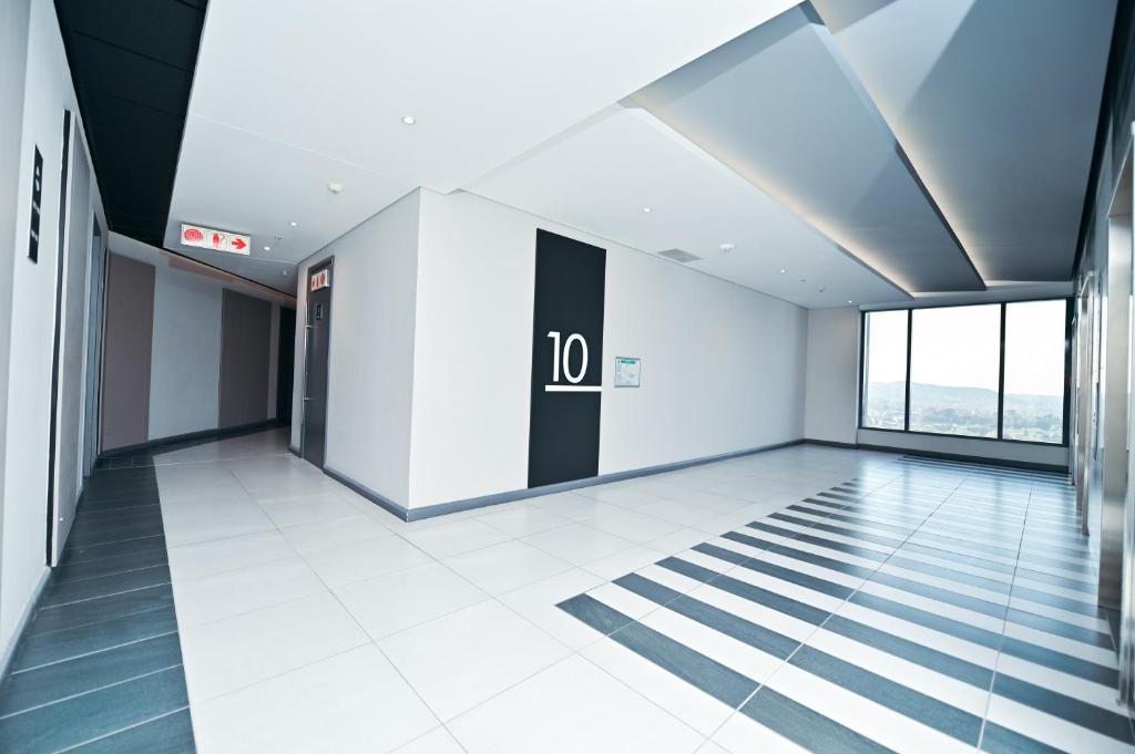 Menlyn Maine Trilogy 10th floor Apartment with balcony, Pretoria ...