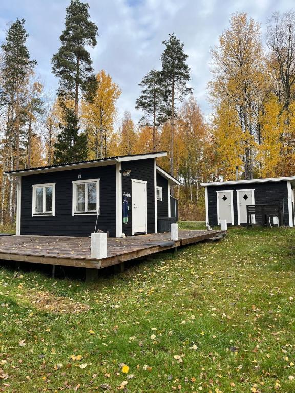 A simple stuga on a lake incinerating toilet in a separate building ...