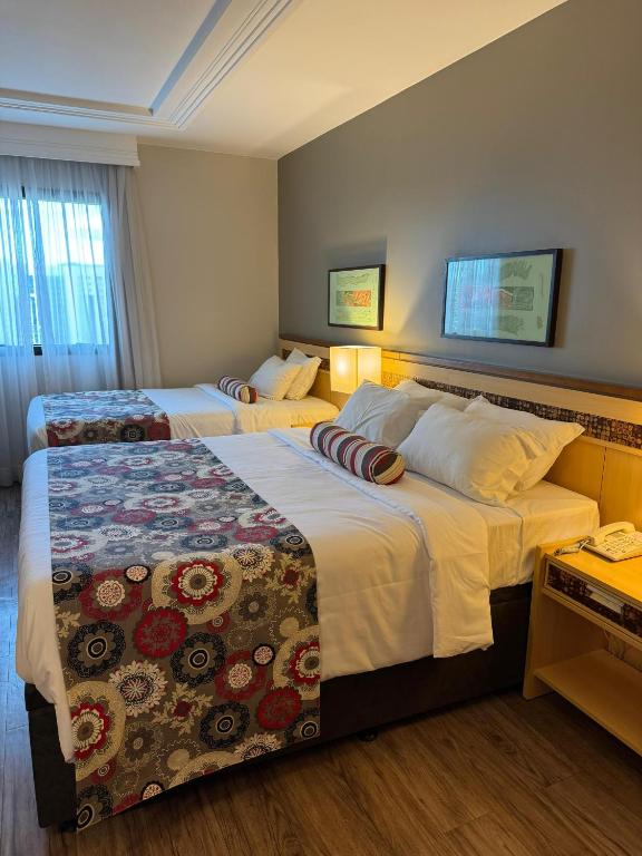 Alto Padrão - Cama Queen e Viuvão no Hotel Let's Idea, Brasilia ...