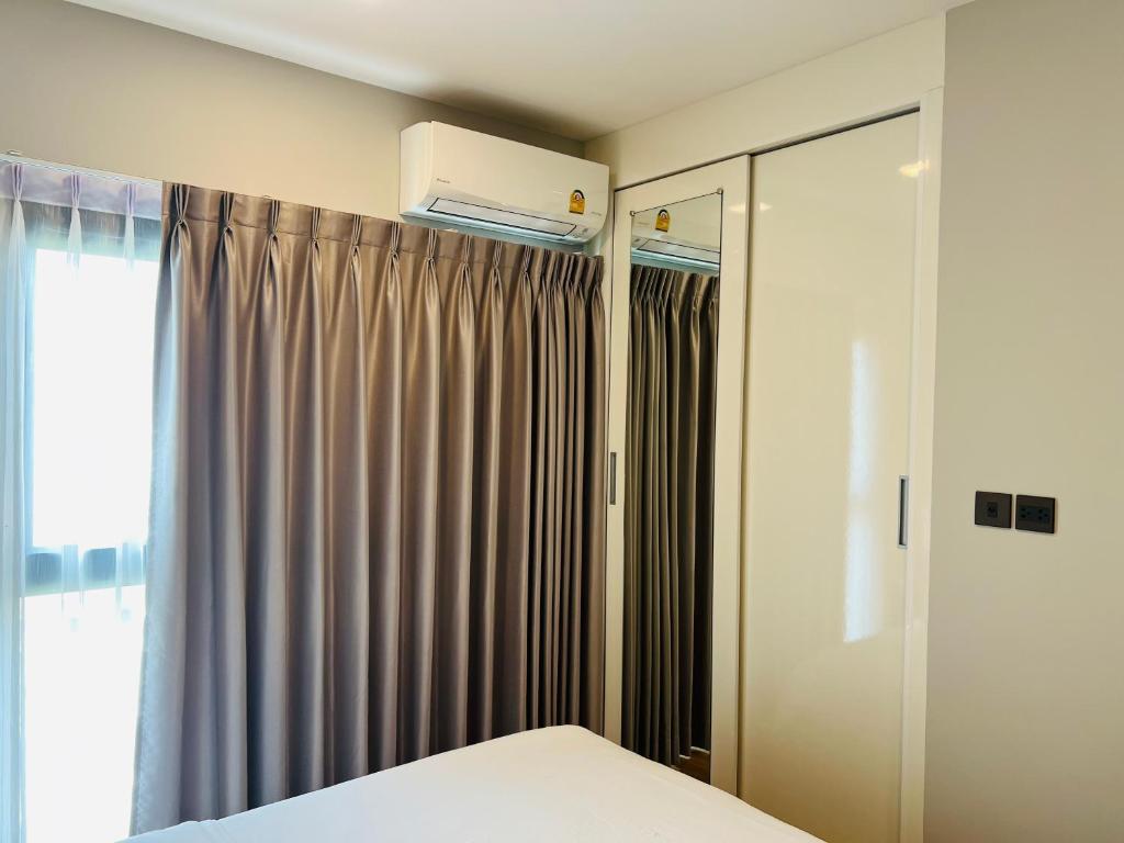 Luxury One-Bedroom Suite at Astra Sky River Infinity Pool, Work ...