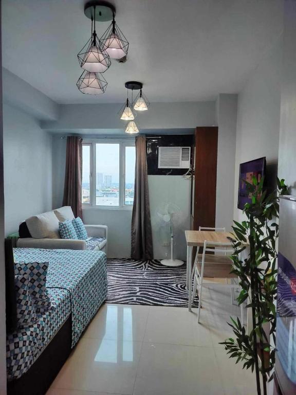 Cozy Studio Unit in Quezon City with Private Pool and City Views ...