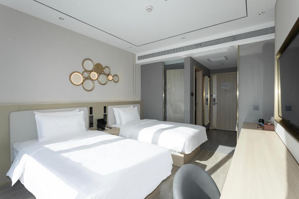 Orange Beijing Wukesong Shijingshan Wanda Plaza Hotel, Pekín (precios ...