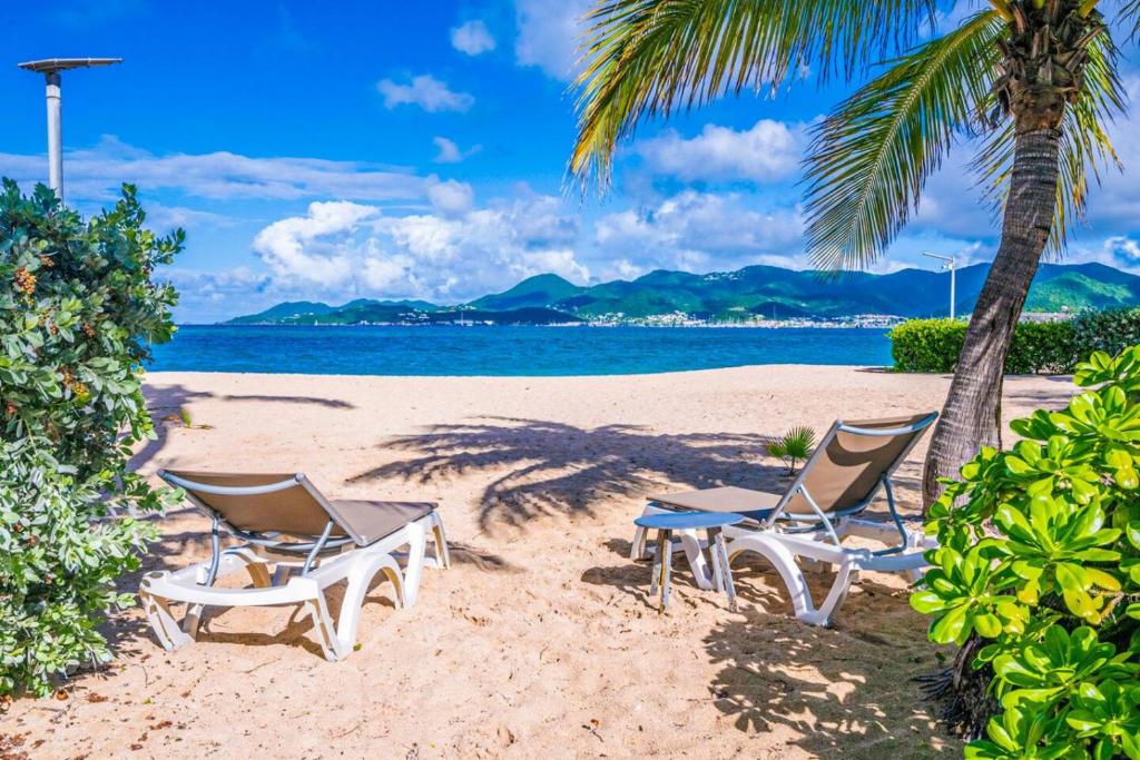 Cottage Beach House NBBC 2, beachfront, pools, Baie Nettle (atnaujintos ...